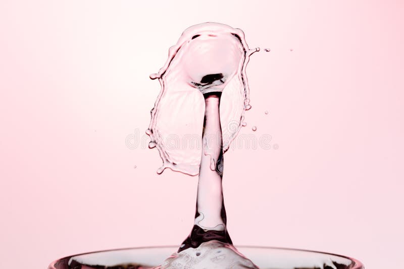 Water Drop Splash with Ripples on Water Surface Stock Photo - Image of ...