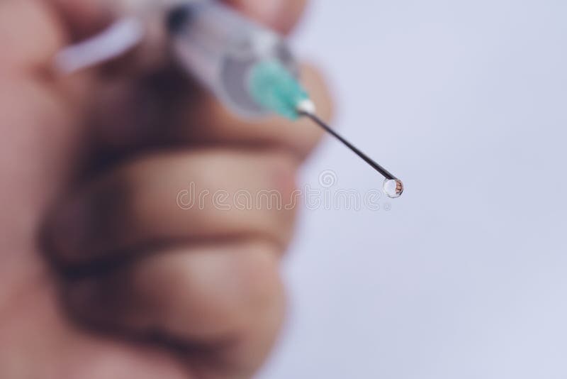 Drop on syringe needle stock photo. Image of drug, narcotic - 90799998