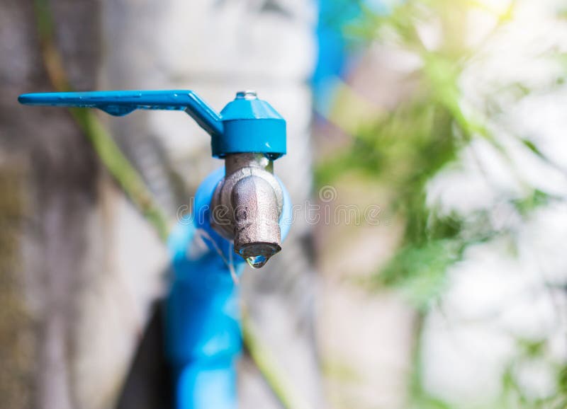 Dripping tap with drop. stock image. Image of brass, faucet - 96365543