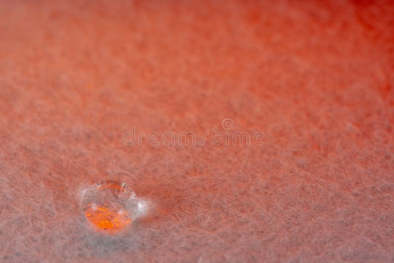 Water Drop on Top of White Fabric Sheet with Red Light Stock Image ...
