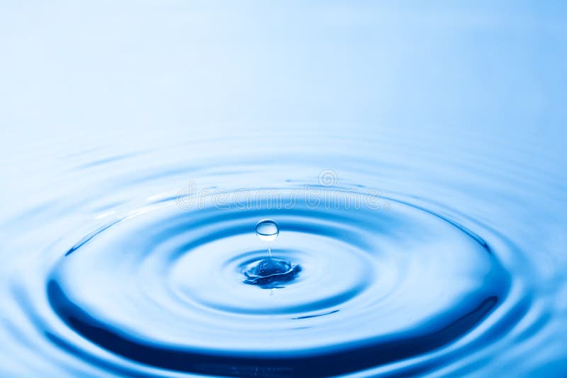 Water Droplet Falling Impact with Water Surface. Causing Rings on Water ...