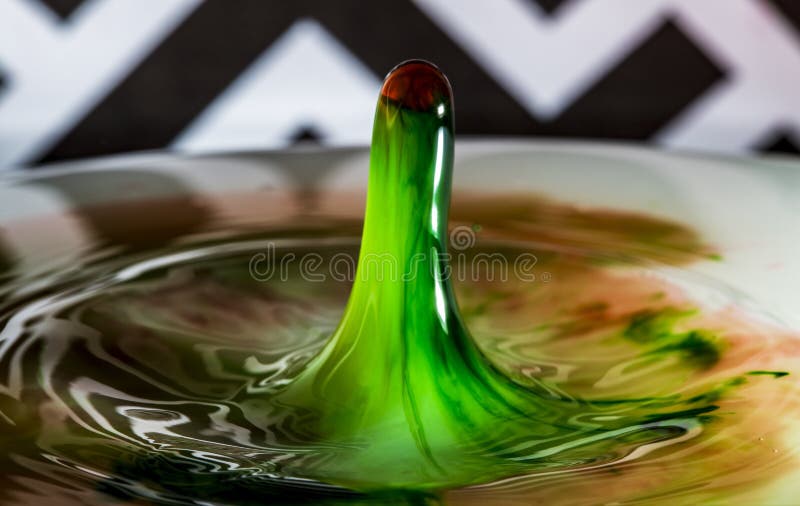 Water Droplet in a Pool of Water Stock Image - Image of surface ...