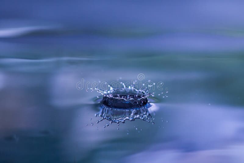 Water droplet ring splash stock image. Image of speed - 40550427