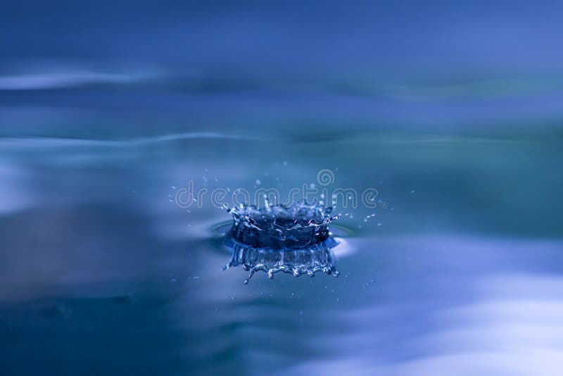 Water droplet ring splash stock image. Image of speed - 40550427