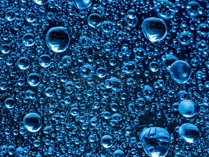 Water Droplets Blue Light with Dark Background Stock Photo - Image of ...