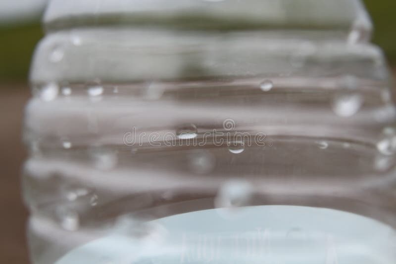 Water Droplets in Bottle. Drops of Water in the Rings of Bottle Stock ...