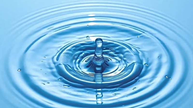 Water Droplets Creating Concentric Rings on the Surface, Light Blue ...