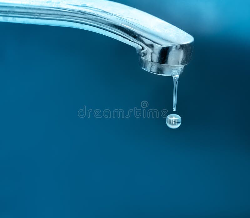 Water Droplets Drip Flowing from Chrome Faucet on a Blue Background. of ...