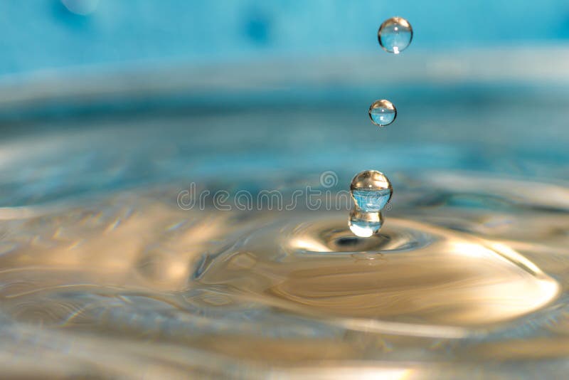 Pure Water Droplet Splashing on Water Surface Forming Beautiful Shapes ...