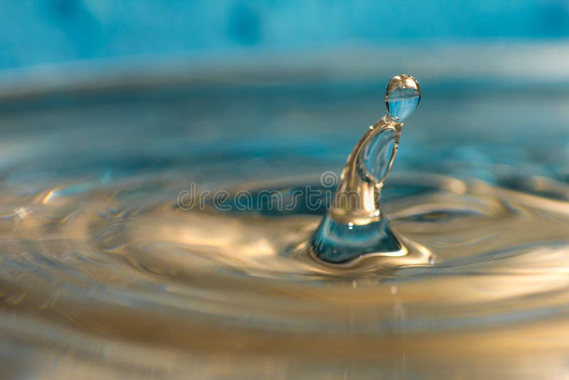Water Droplets Falling Down and Forming Abstract Shapes Stock Photo ...
