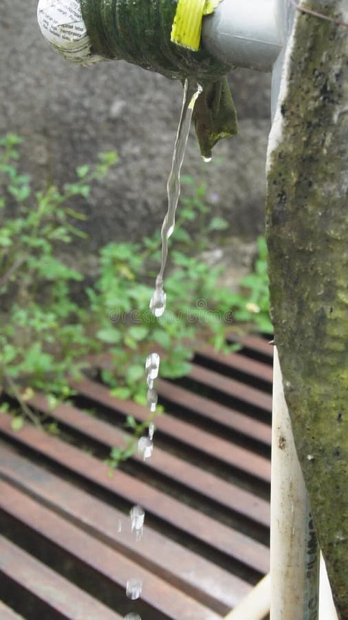 Water Droplets Falling from Pipe Stock Footage - Video of droplets ...