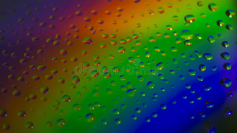 Water Droplets on Rainbow Light Background Stock Image - Image of ...