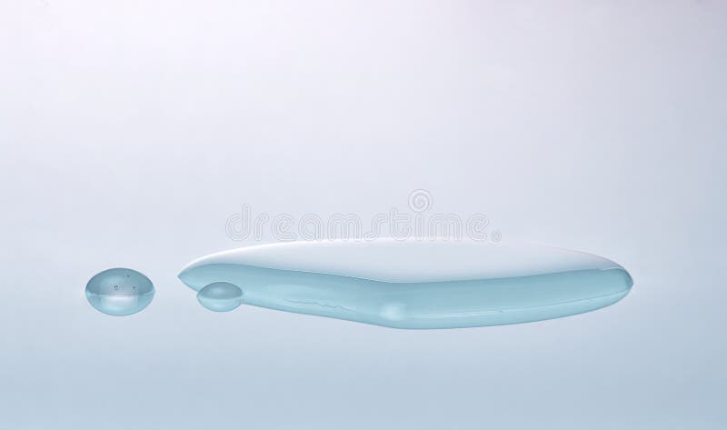 Water Puddle from Drops Spilled Onto Surface. Stock Photo - Image of ...