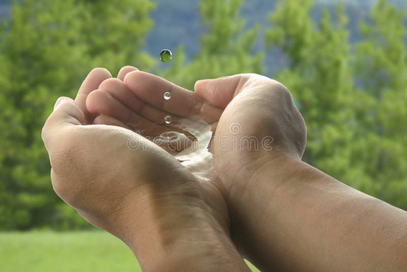 Water dropping on hand stock photo. Image of hand, raindrop - 40854652
