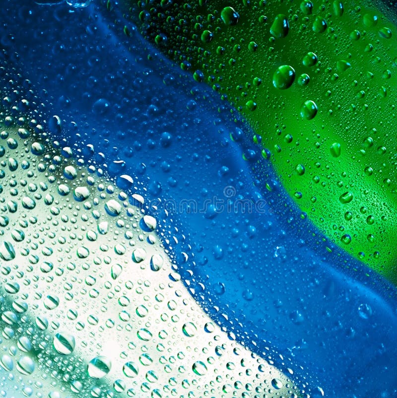 Abstract Texture. Water Drops on Glass with Blue and Yellow Background ...