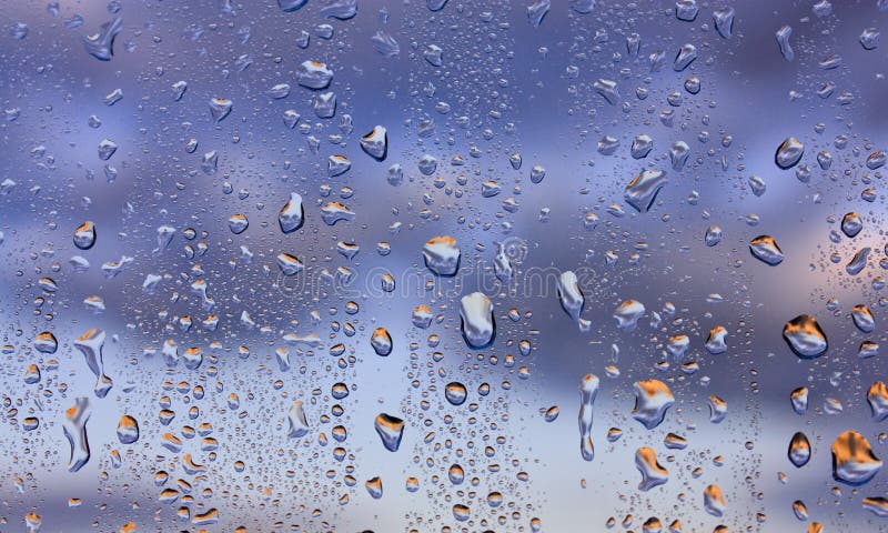 Golden Amber Water Drops stock image. Image of drink, shape - 4683827