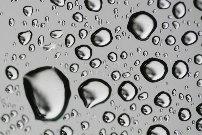 Golden Amber Water Drops stock image. Image of drink, shape - 4683827