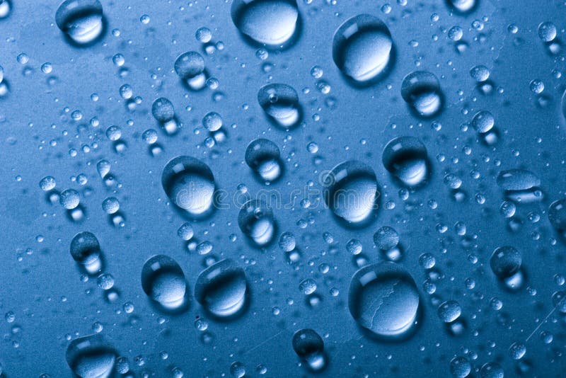 Golden Amber Water Drops stock image. Image of drink, shape - 4683827