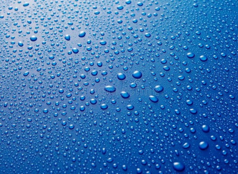 Water Drops Beaded on Blue Metallic Surface Stock Photo - Image of ...