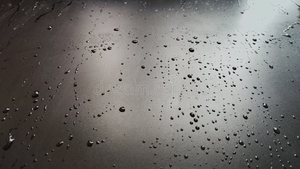 Water Drops on a Black Plastic. Surface with Wet Background. Abstract ...