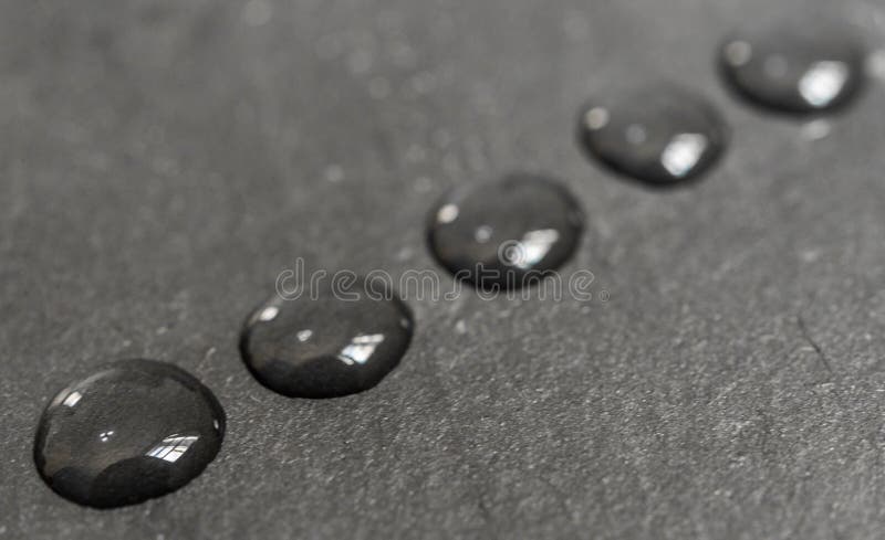 Water Drops on a Black Slate Background. Stock Image - Image of macro ...