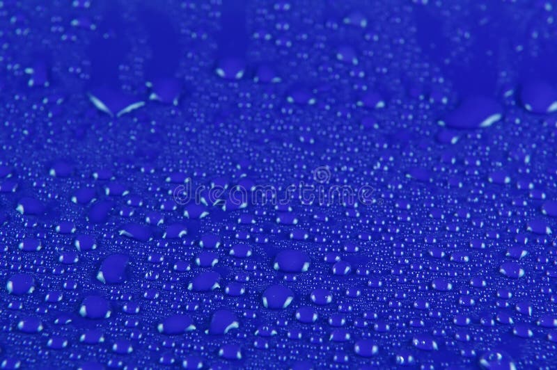 Water drops on blue stock photo. Image of droplets, glass - 1704208