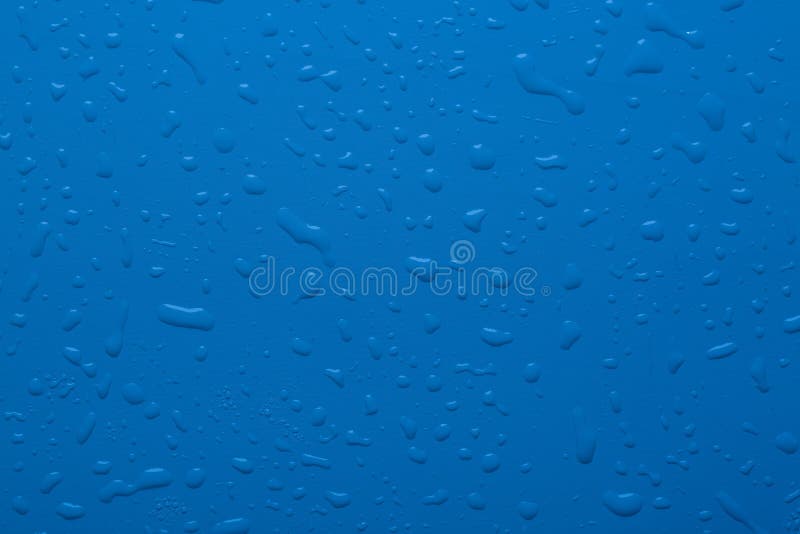 Water Drops on Blue Color Surface Stock Photo - Image of drop, pure ...