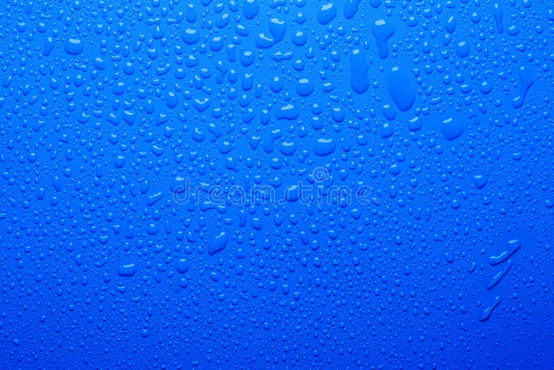 Water Drops on Blue Color Surface Stock Photo - Image of background ...