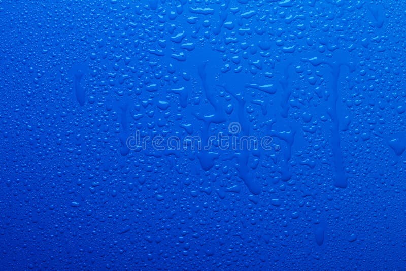 Water Drops on Blue Color Surface Stock Image - Image of glass, water ...