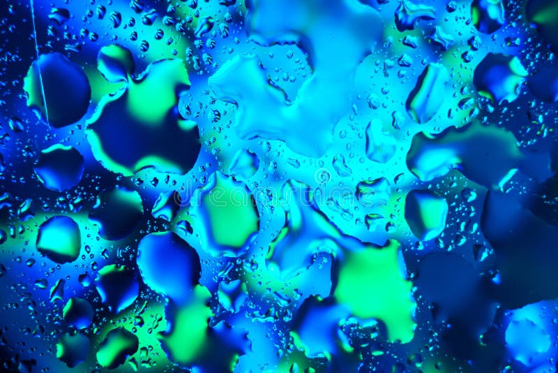 Water Drops on a Colorful Abstract Background with Gradient Green and ...