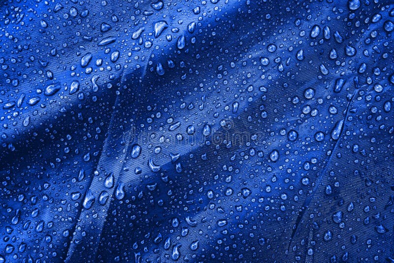 Water drops on the fabric. stock image. Image of jacket - 206227459