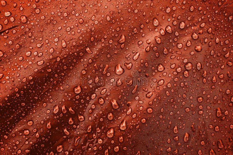 Water drops on the fabric. stock photo. Image of light - 206227562