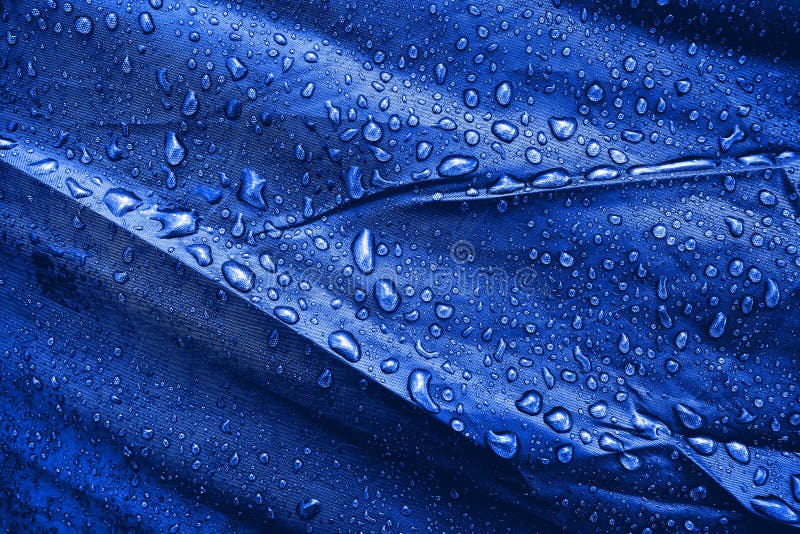 Water drops on the fabric. stock photo. Image of environment - 206228224