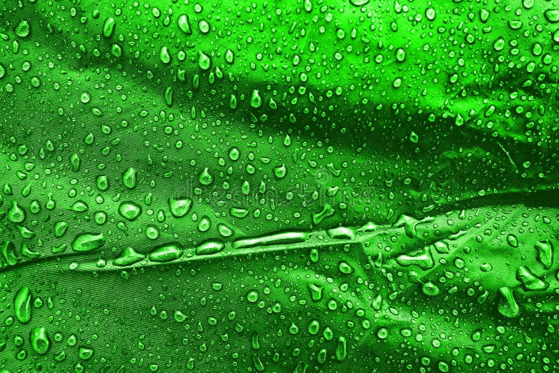 Water drops on the fabric. stock photo. Image of material - 206228354