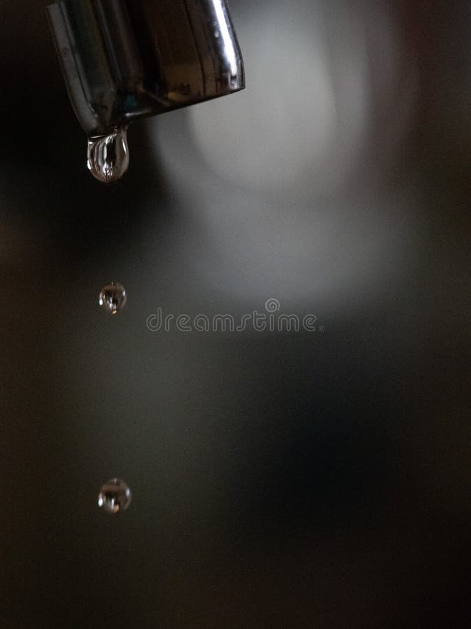 Water Drops Falling from a Tap Stock Photo - Image of horizontal, blue ...