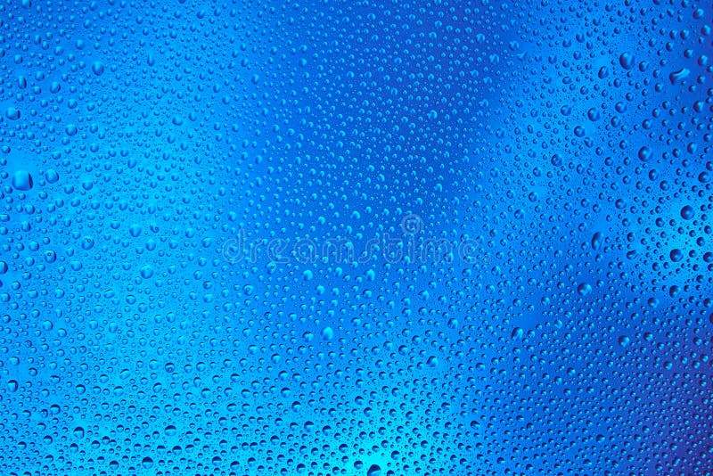 Water Drops on Glass with a Color Gradient Stock Image - Image of ...