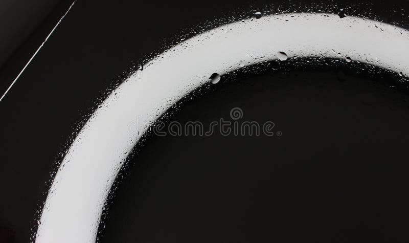 Water Drops on a Glass Over Curved Lamp Texture Background Stock Photo ...
