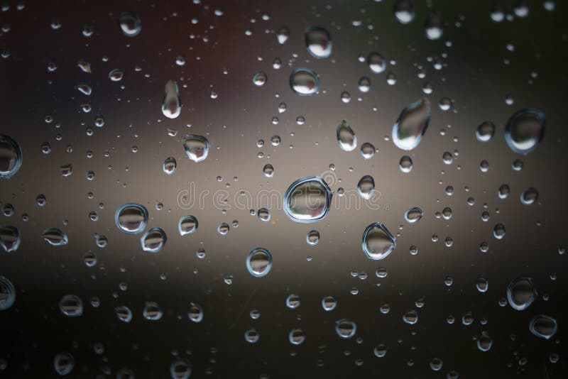 Water Drops on Glass Showing Unique Patterns and Reflections Stock ...