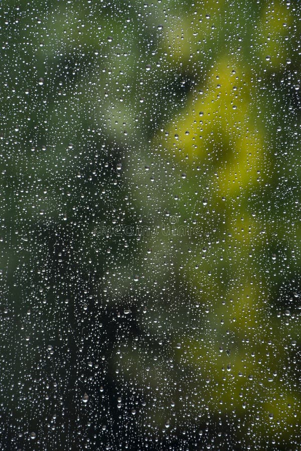 Water Drops on Glass Showing Unique Patterns and Reflections Stock ...