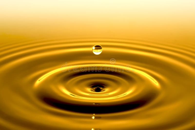 Water Drops Hitting the Clean Surface of the Water Close-up Stock Image ...
