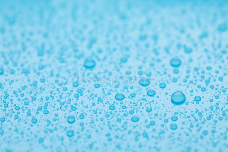 Water Drops On Light Blue Background, Closeup Stock Photo - Image of ...