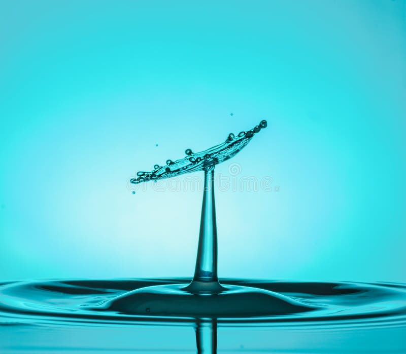 Water Drop Collisions Macro Photography with Blue Background Stock ...