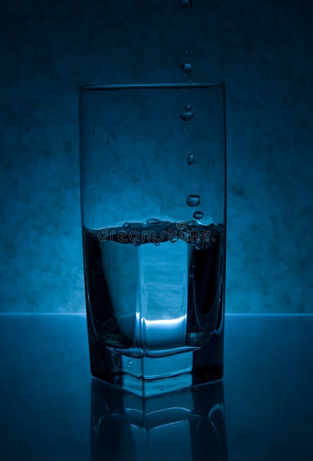Water Drops Pouring into Glass Stock Photo - Image of action, cool: 3435006