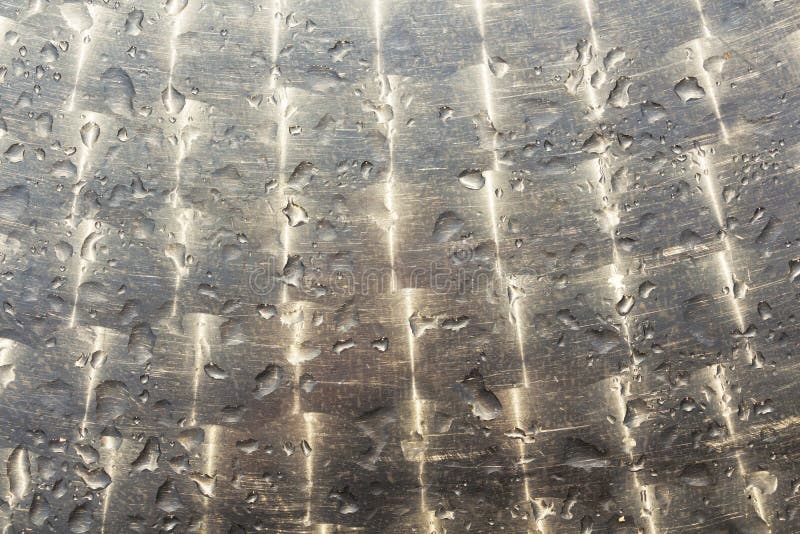 Water Drops on a Shiny Metal Surface. Background. Stock Photo - Image ...