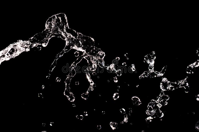 Water Drops Splash on Black Background. Splashing in Motion. Water ...