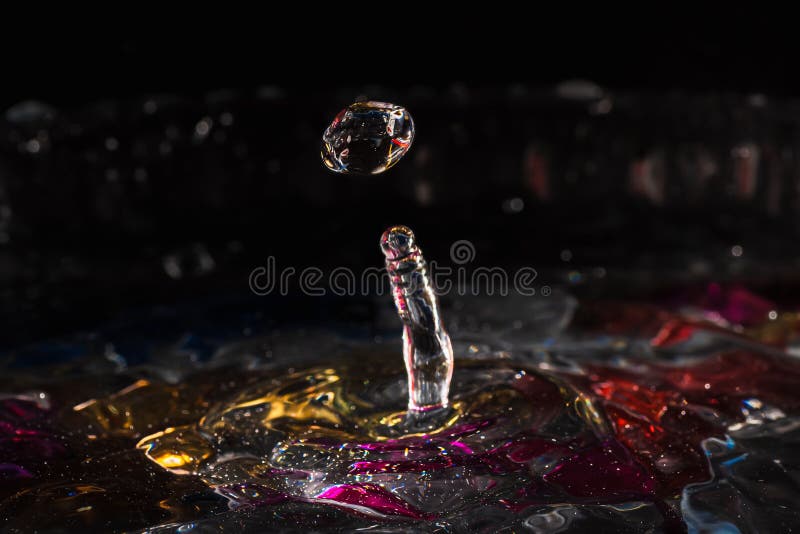 Water Drops Splash Forming Ripples and Waves and Abstract Water Columns ...