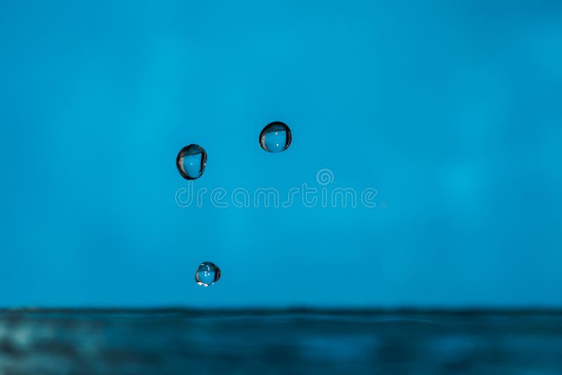 Water Drops Splash Forming Ripples and Waves and Abstract Water Columns ...