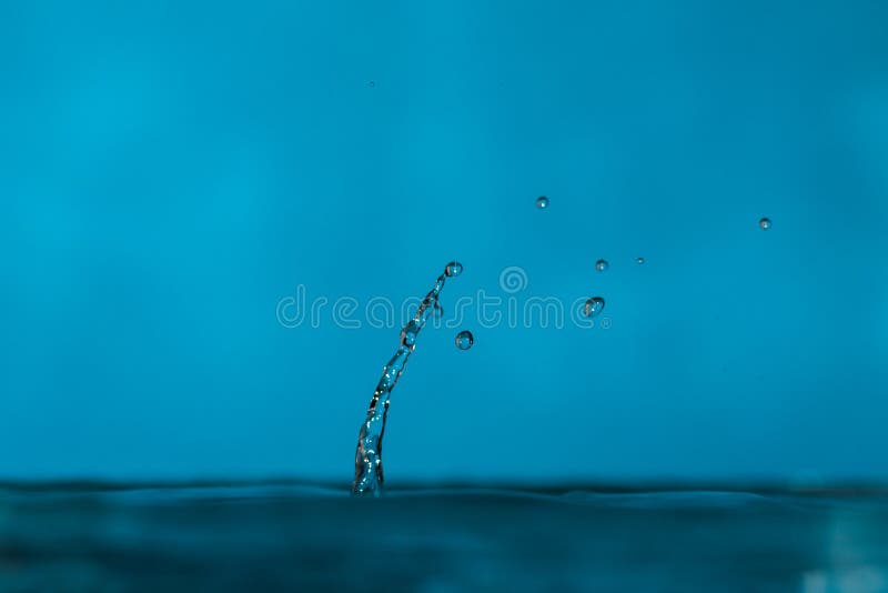 Water Drops Splash Forming Ripples and Waves and Abstract Water Columns ...