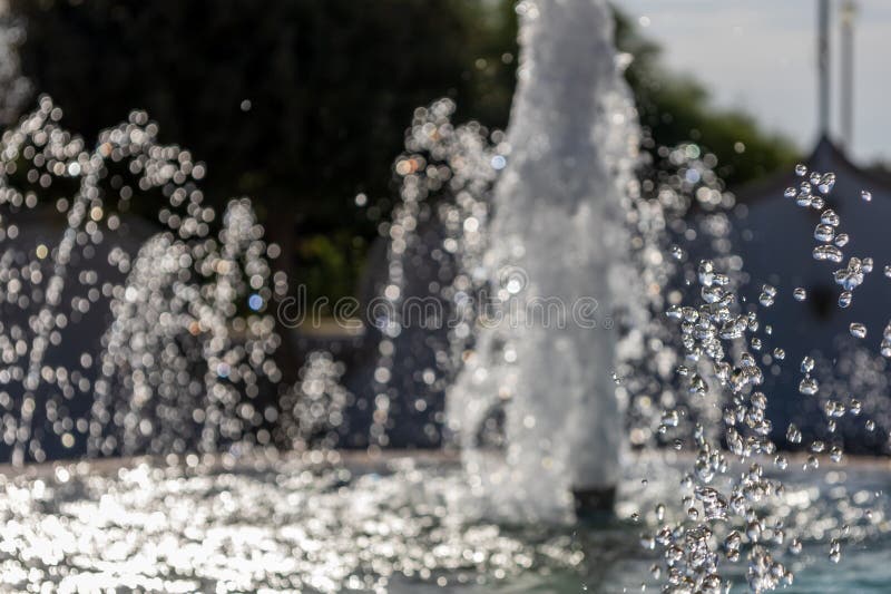 Water Drops Splashing from a Fountain in a Park Stock Photo - Image of ...