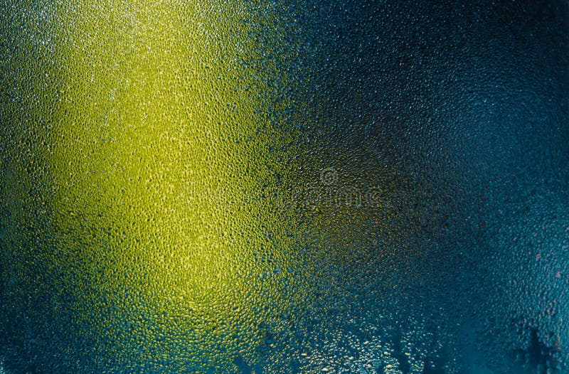 Water drops on wet glass stock photo. Image of design - 193957002